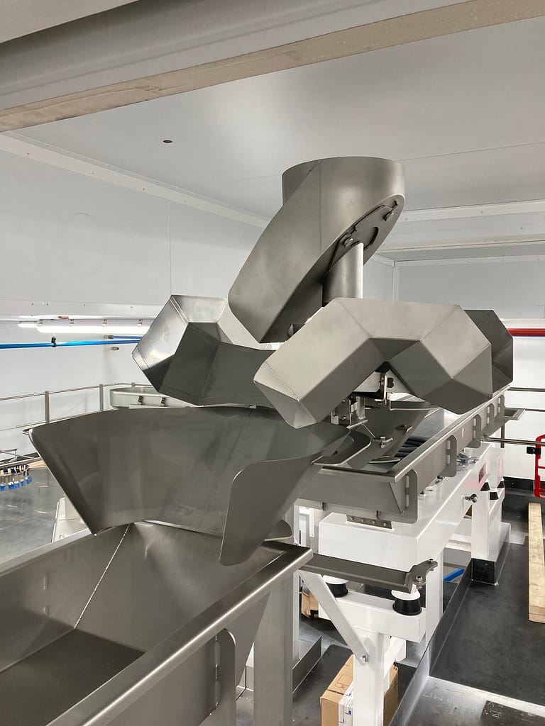 Servo Assisted Proportioning Chute - KMG Systems